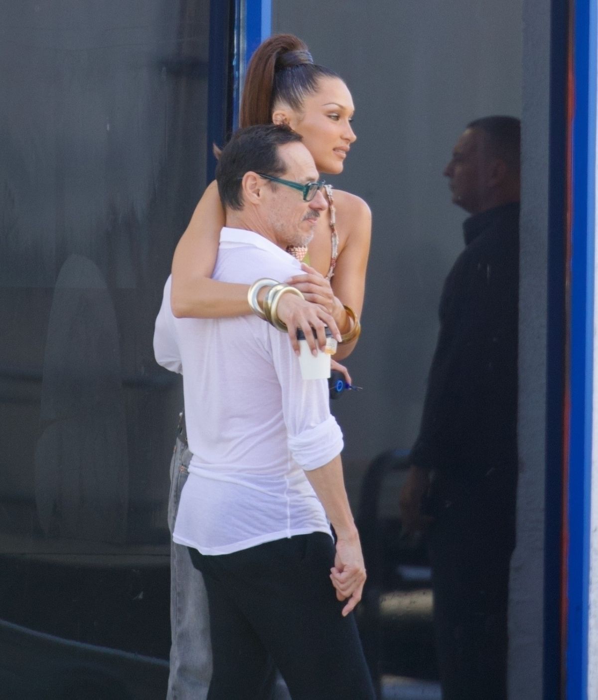 BELLA HADID Models a 60’s Style Ponytail and Crochet Tank Top on Set of ...
