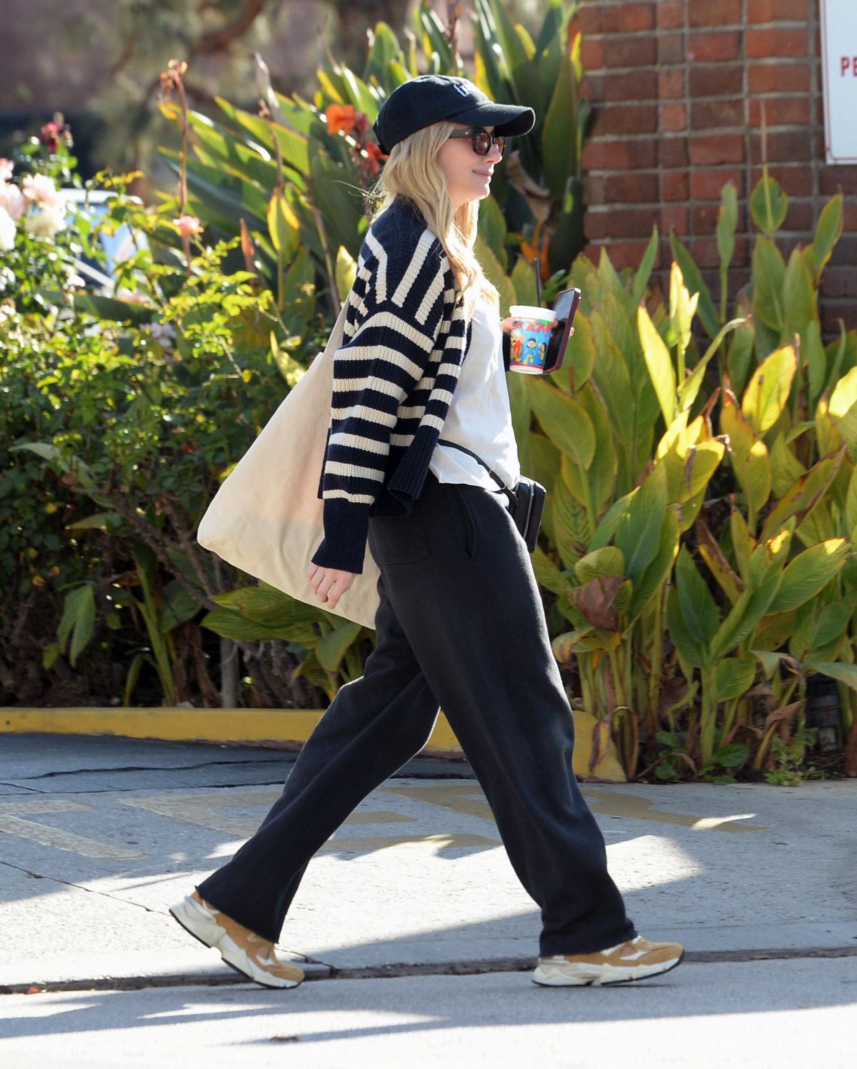 EMMA ROBERTS Arrives at Front Row Card Show in Los Angeles 11/24/2024 ...