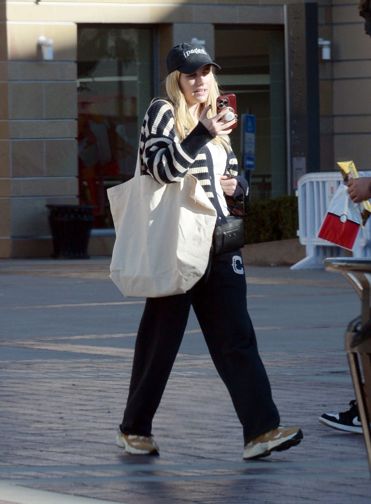 EMMA ROBERTS Arrives at Front Row Card Show in Los Angeles 11/24/2024 ...