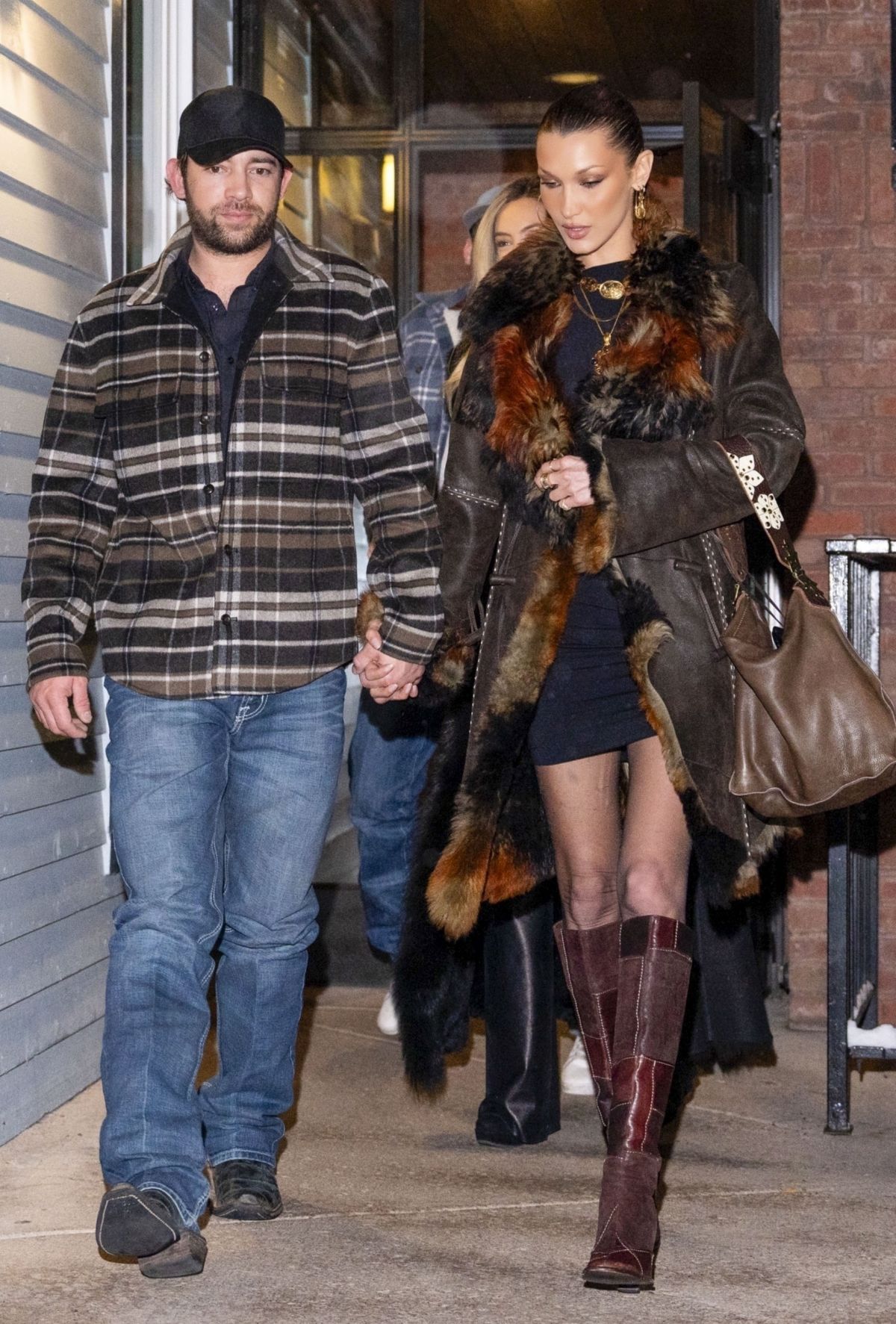 BELLA HADID and Adan Banuelos Leaves Matsuhisa in Aspen 12/31/2024 ...