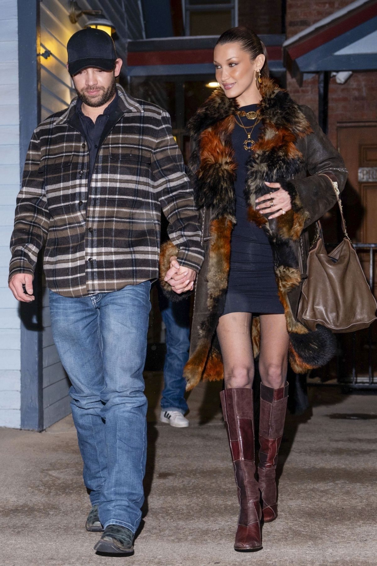BELLA HADID and Adan Banuelos Leaves Matsuhisa in Aspen 12/31/2024 ...