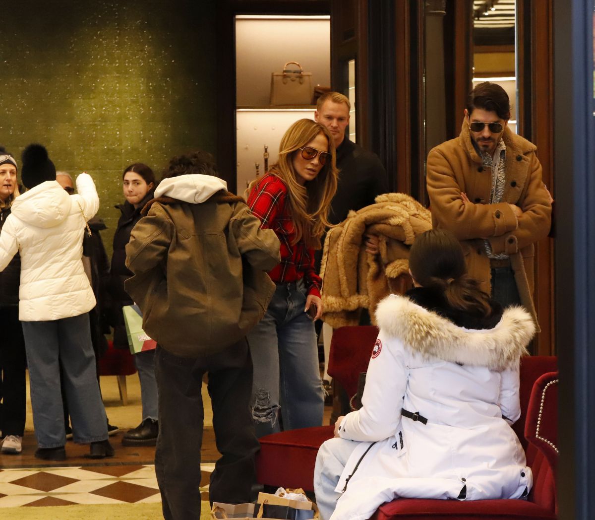 JENNIFER LOPEZ Out Shopping with Family and Friends at Gucci in Aspen ...
