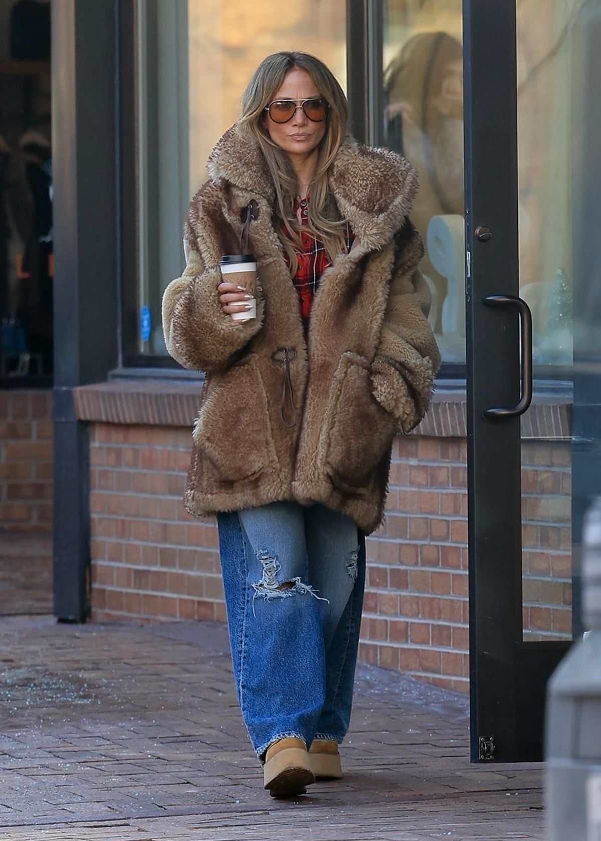 JENNIFER LOPEZ Out Shopping with Family and Friends at Gucci in Aspen ...