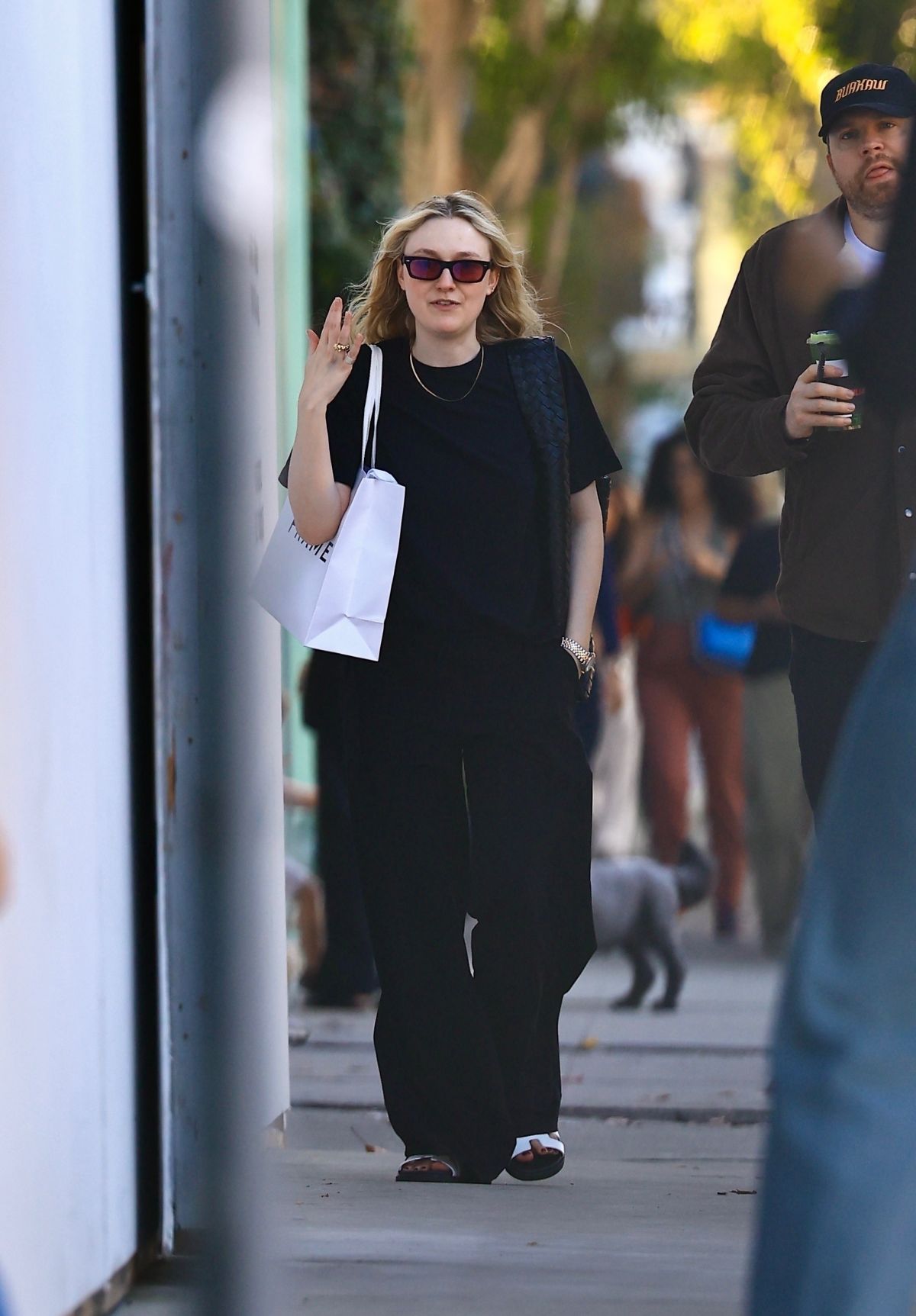 DAKOTA FANNING Out Shopping on Melrose Place with David Bernard 01/02 ...
