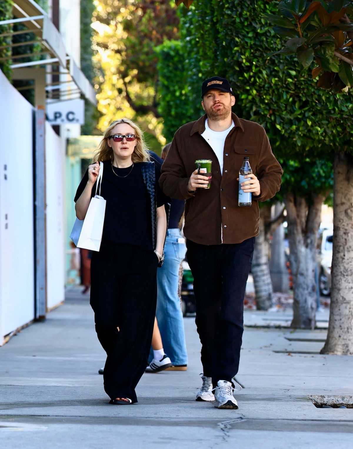 DAKOTA FANNING Out Shopping on Melrose Place with David Bernard 01/02 ...