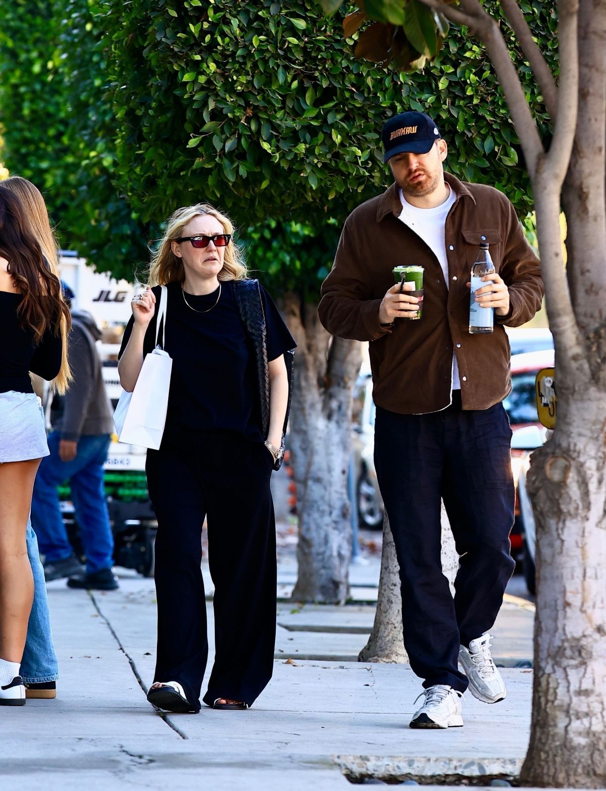 DAKOTA FANNING Out Shopping on Melrose Place with David Bernard 01/02 ...