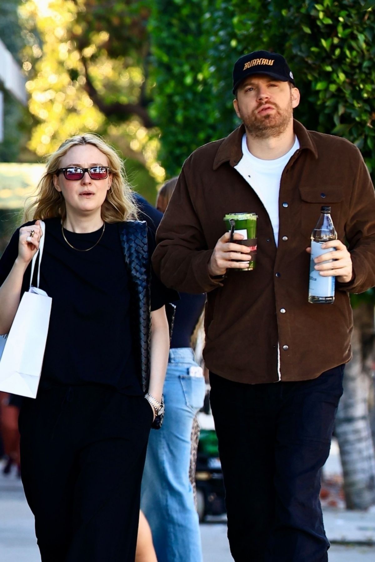 DAKOTA FANNING Out Shopping on Melrose Place with David Bernard 01/02 ...