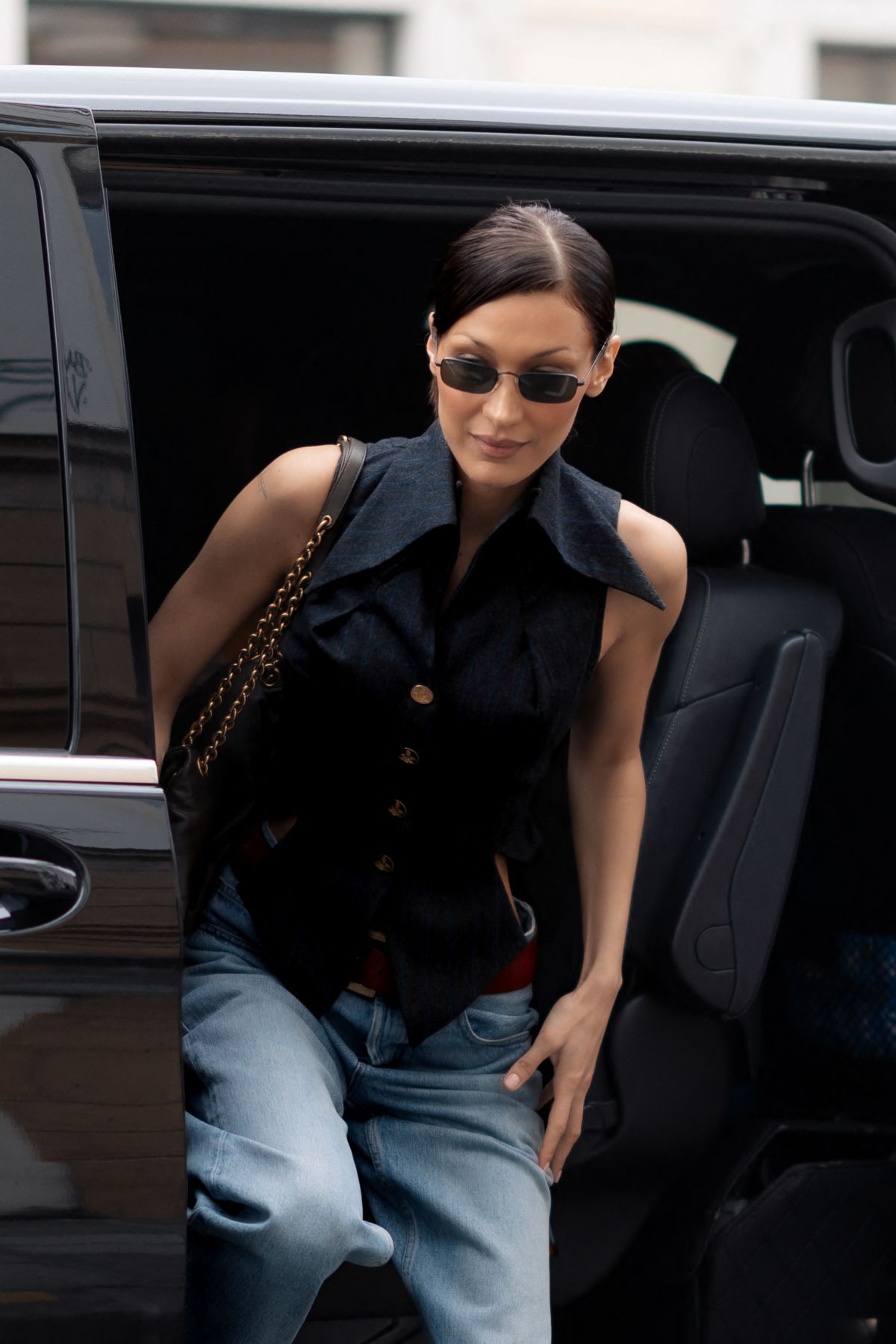 BELLA HADID Visits Nuovo and Saint Laurent Boutiques in Paris 03/10 ...