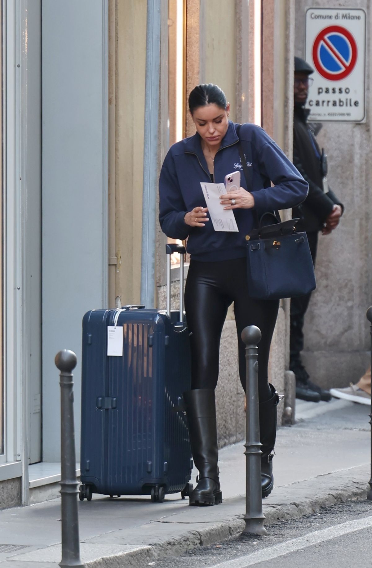 MARIJANA VIDOVIC Purchasing a Suitcase at a Rimowa Store 04/19/2025 ...