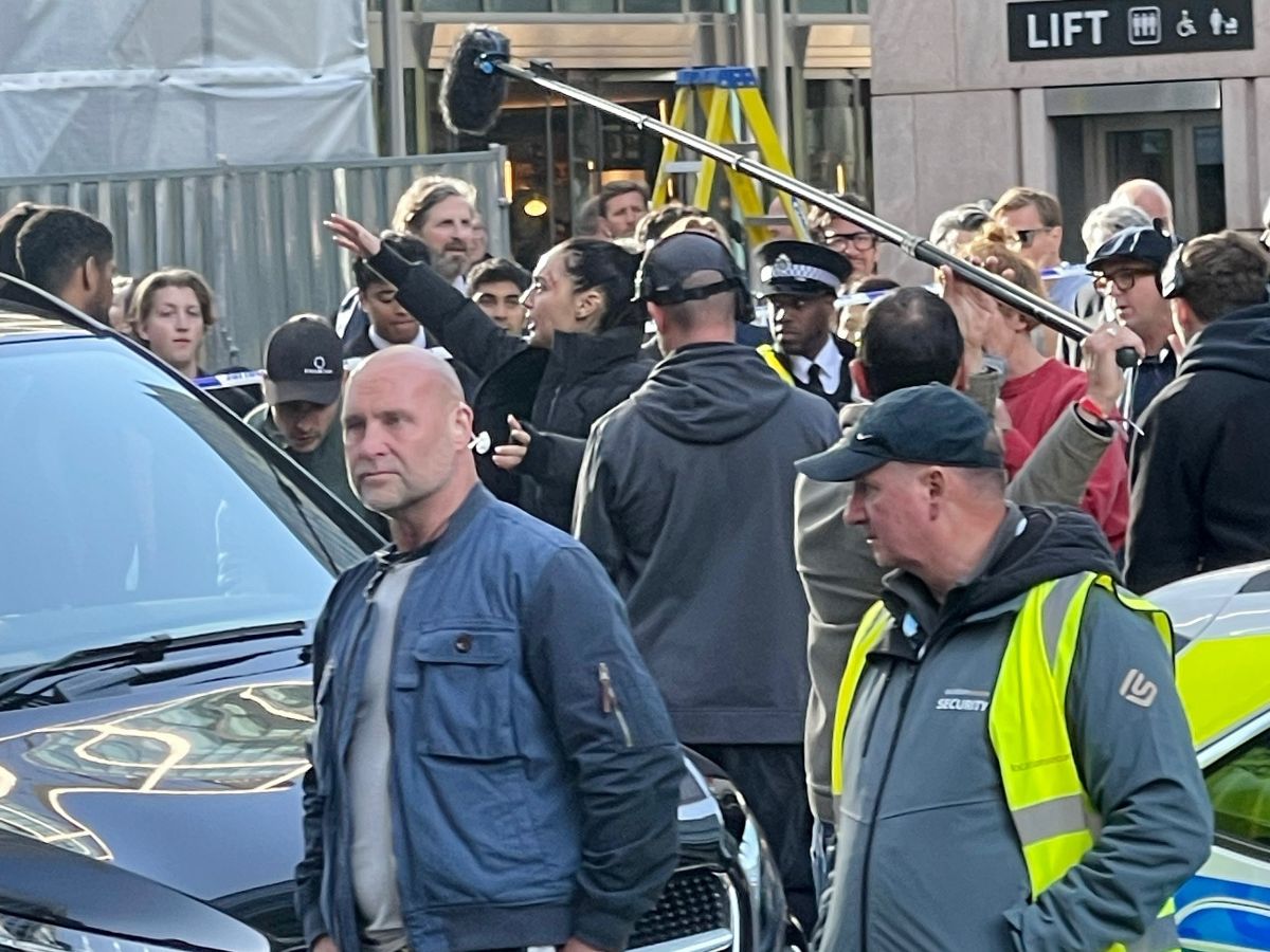 GAL GADOT and Alfred Enoch on the Set of The Runner in Canary Wharf in ...