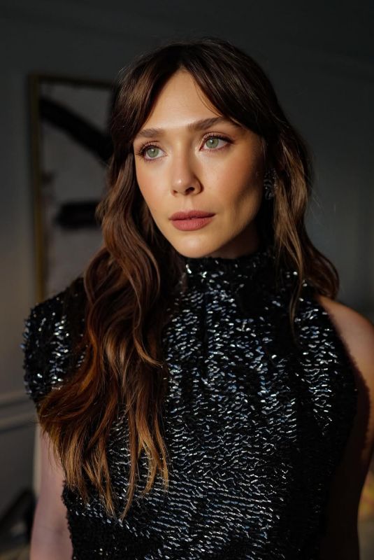 ELIZABETH OLSEN – Eternity Premiere Photoshoot at 2025 TIFF in Toronto ...