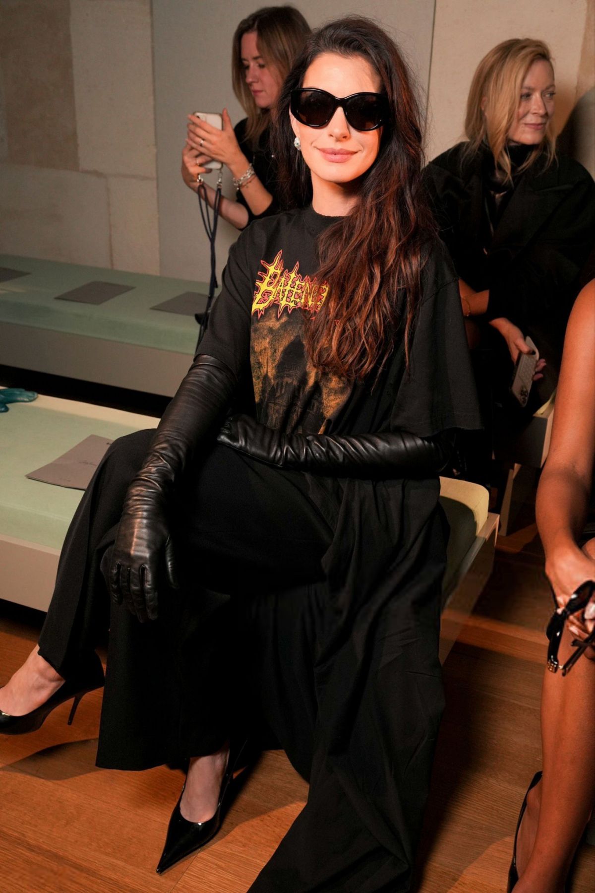 ANNE HATHAWAY at Balenciaga Fashion Show at Paris Fashion Week 10/04 ...