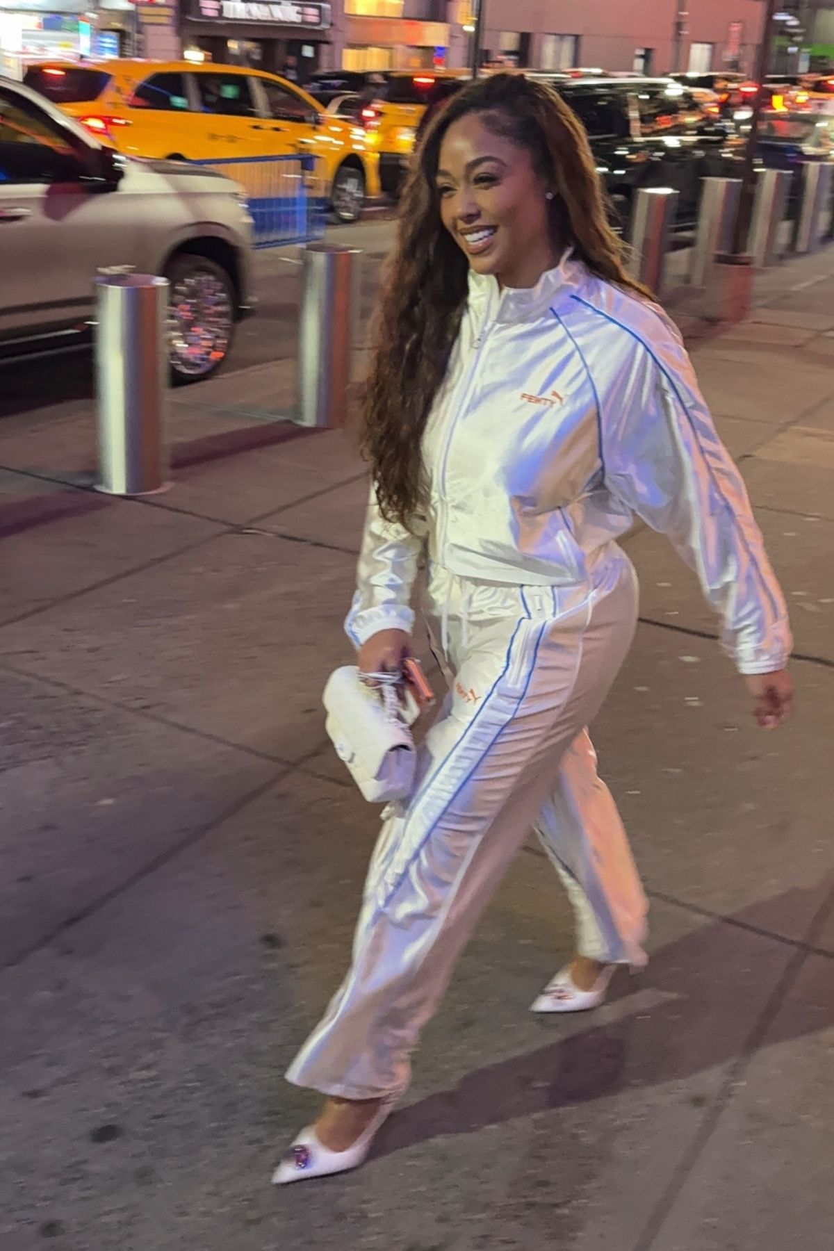 JORDYN WOODS in a White Tracksuit Arrives at Knicks Game in New York ...