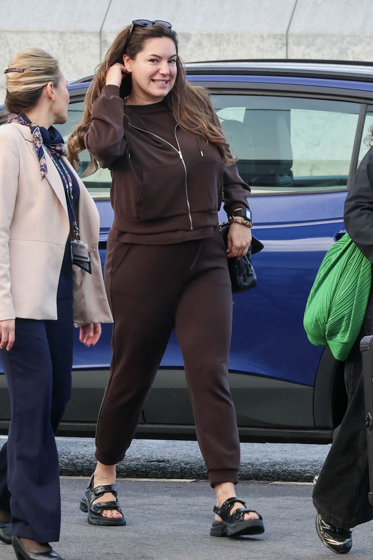 KELLY BROOK MChecks in with Singapore Airlines at Heathrow Airport in ...