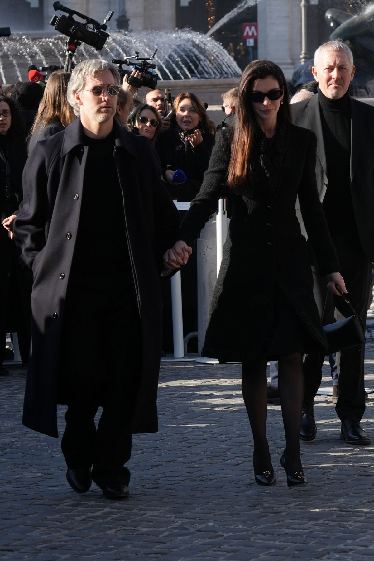 ANNE HATHAWAY at Funeral of Valentino Garavani at Basilica di Santa ...